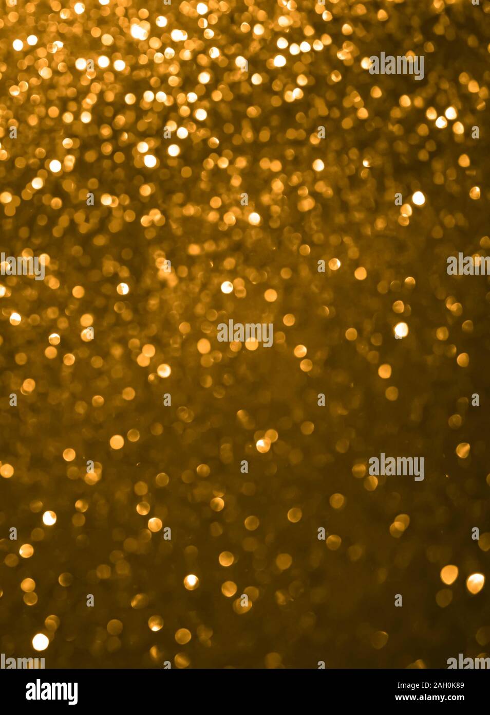 Abstract yellow saffron defocused bokeh glitter sparkle confetti burst ...