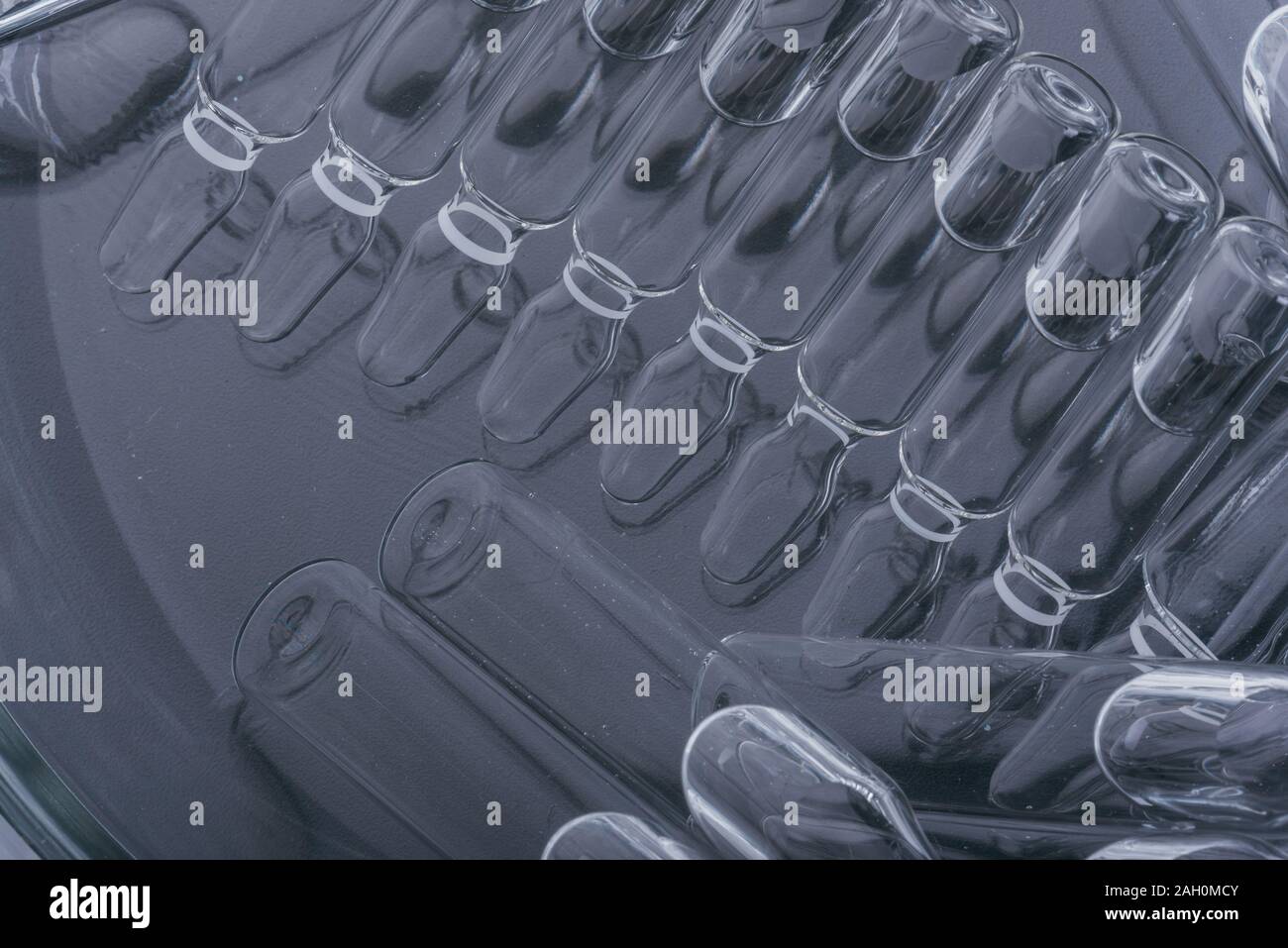 Glass medical ampoule vial for injection. Medicine is liquid sodium ...