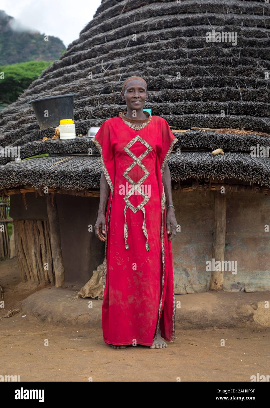 Larim tribe woman in front of her traditional house, Boya Mountains ...