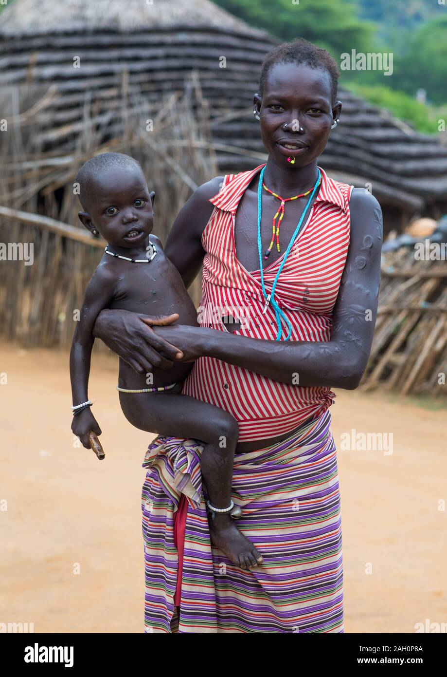 Portrait of a Larim tribe mother carrying her child, Boya Mountains ...