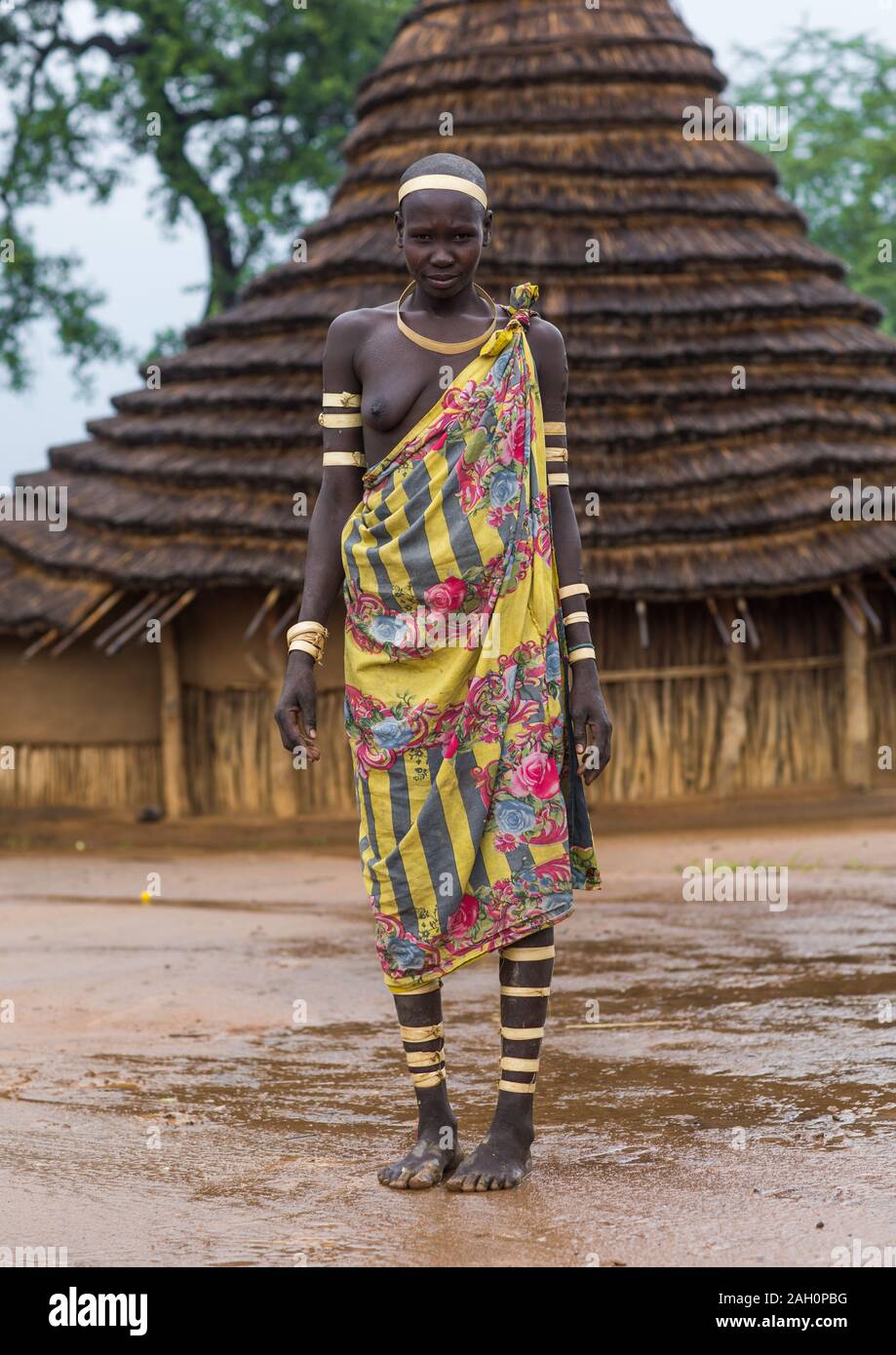 Portrait of a Larim tribe woman wearing bark bracelets as a sign of ...