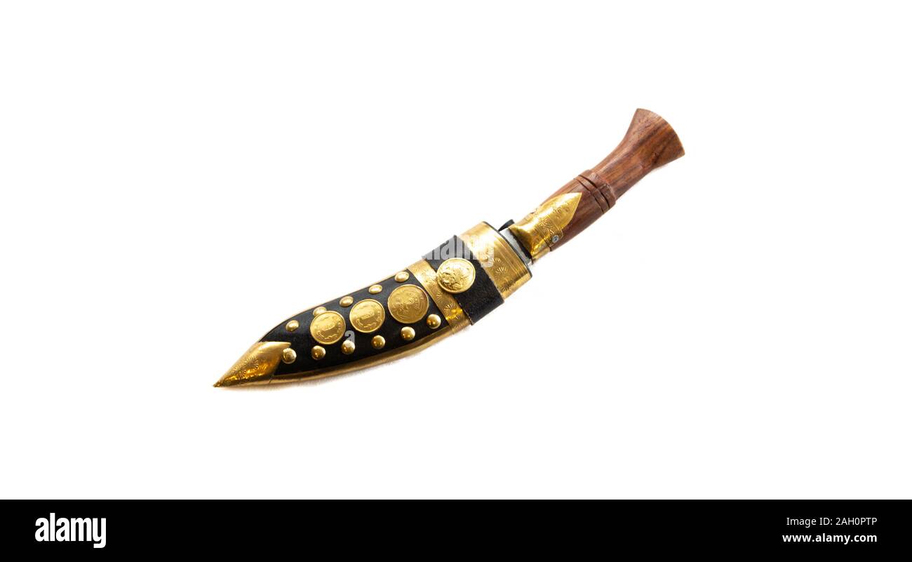 Old indian handmade knife in leather scabbard on a white background ...
