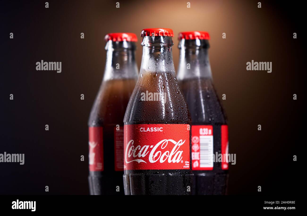 13 december, 2019. Moscow, Russia: Three glass bottles of Coca Cola ...