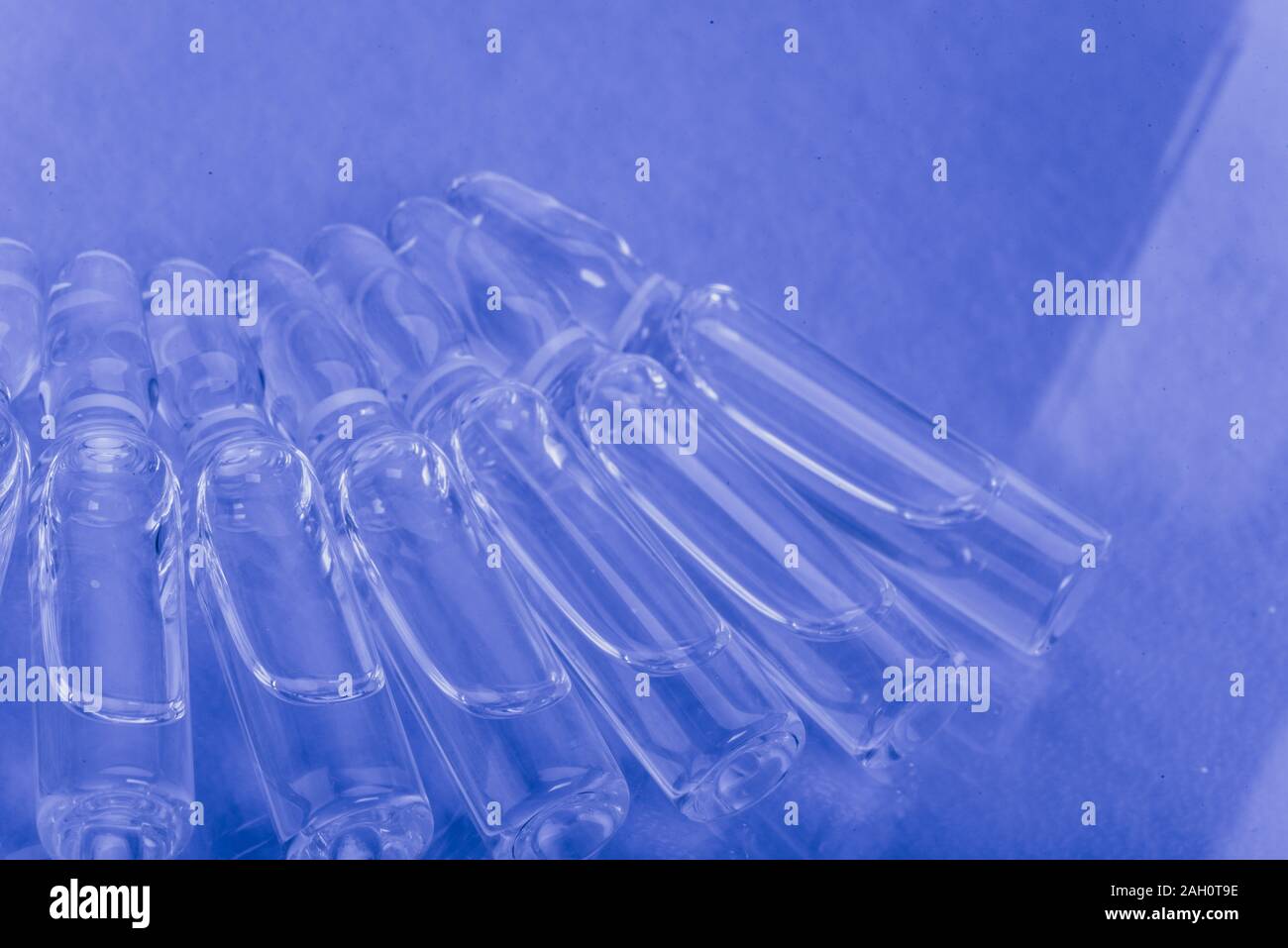 Glass medical ampoule vial for injection. Medicine is liquid sodium ...