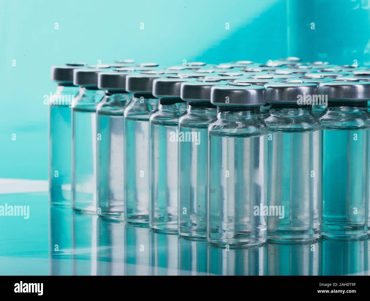 Glass medical ampoule vial for injection. Medicine is liquid sodium ...