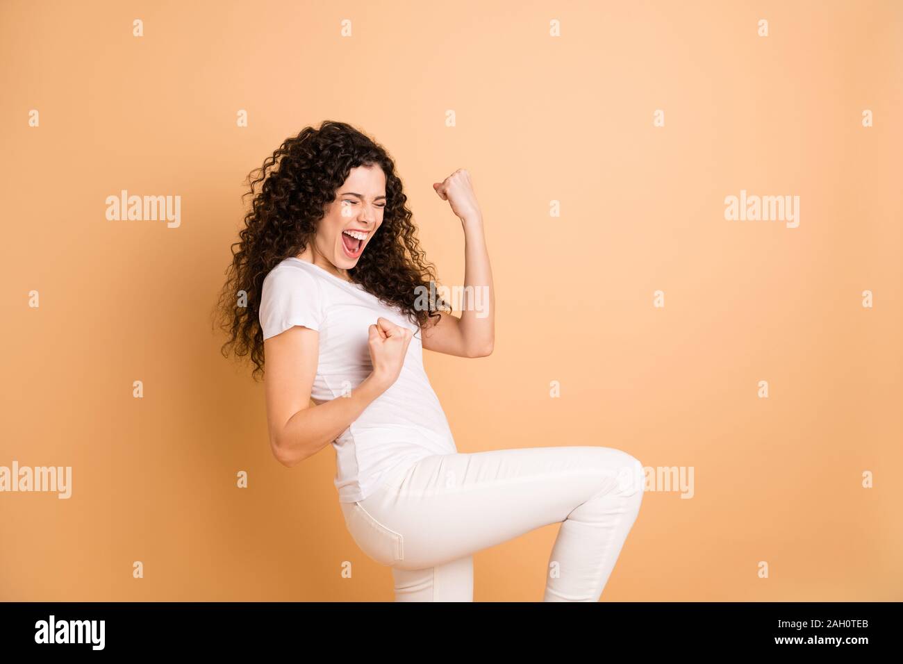 Profile photo of amazing yelling lady triumphing raising fists sale ...