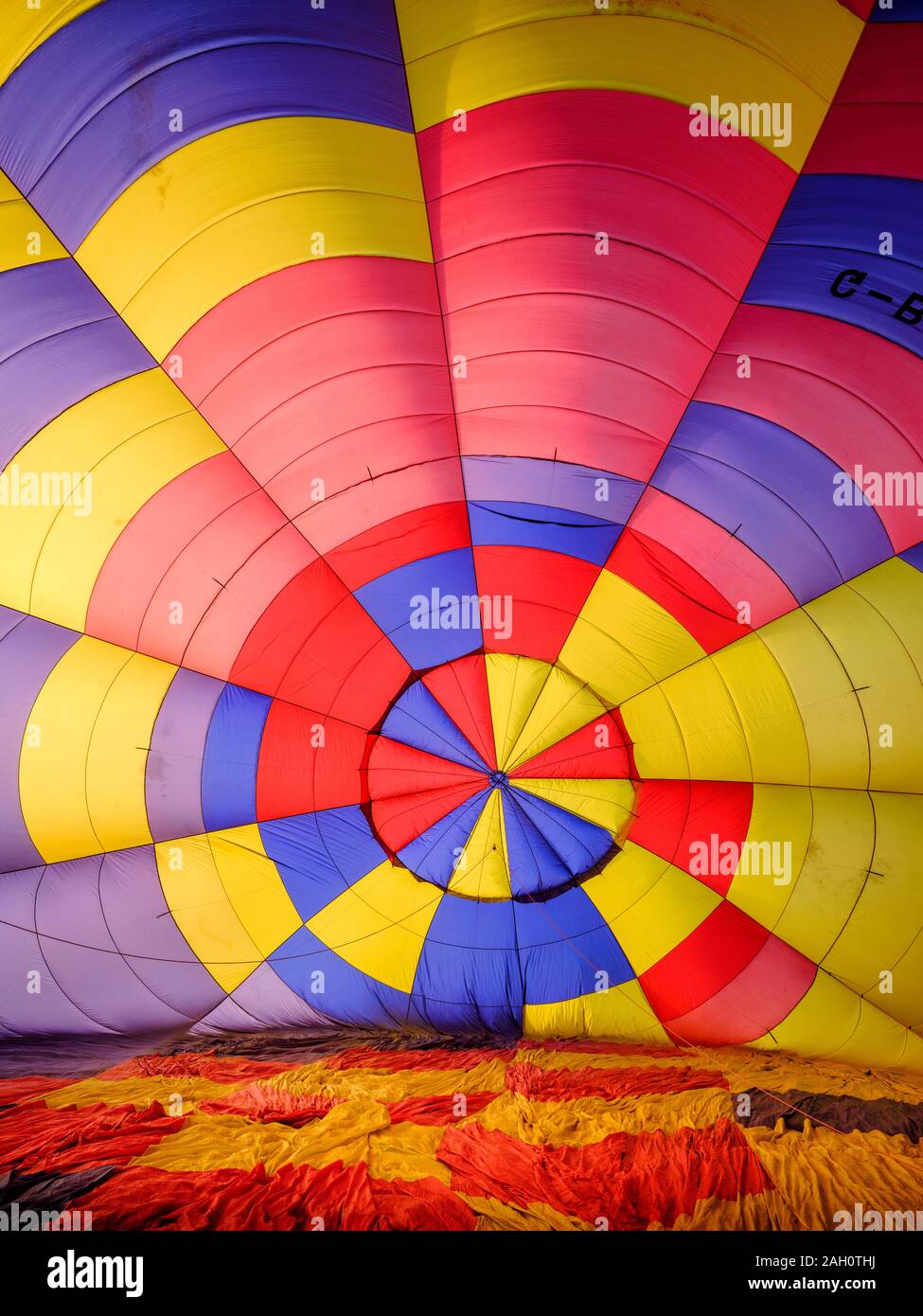 Inside a hot air balloon as it is being prepared for flight on a sunny ...