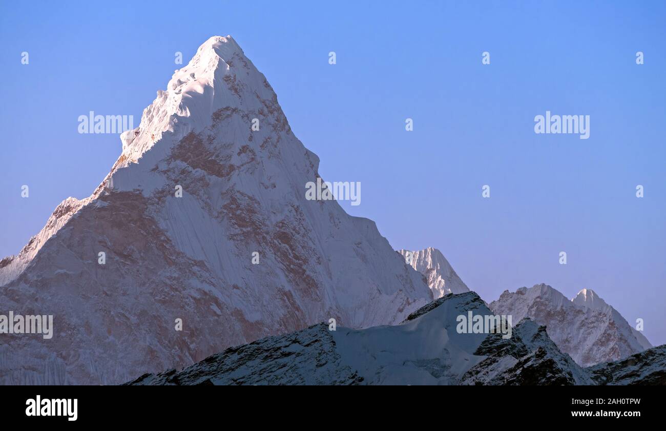 Triangular pyramid of the majestic Ama Dablam (6814 m) peak on the ...
