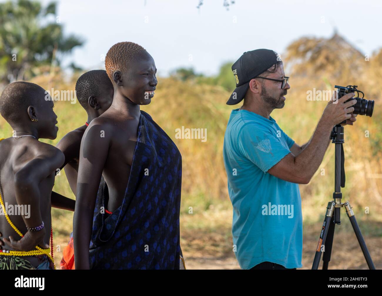 Tourist taking pictures in Mundari tribe, Central Equatoria, Terekeka ...