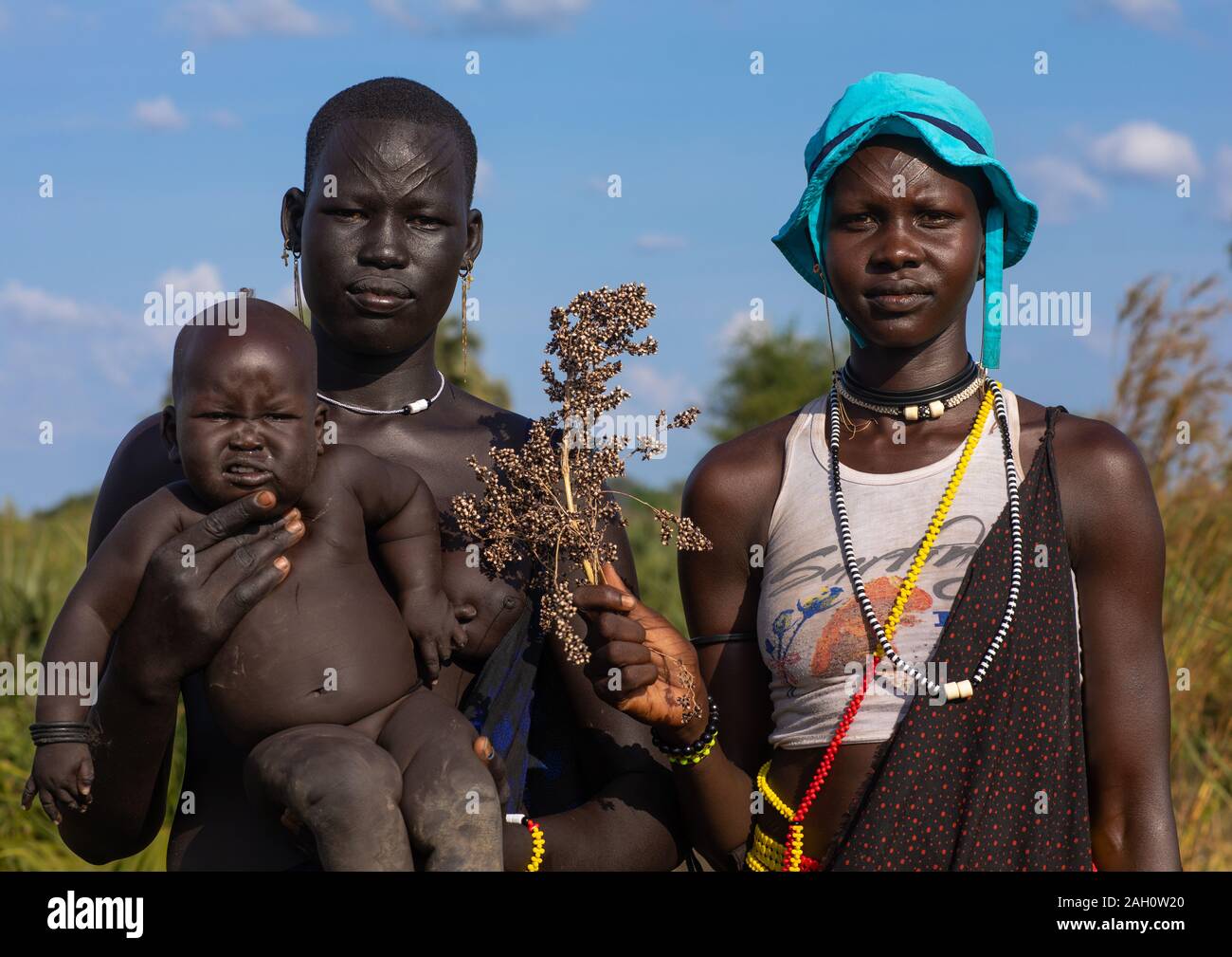 Portrait of Mundari tribe women with a child, Central Equatoria, Terekeka, South Sudan Stock ...