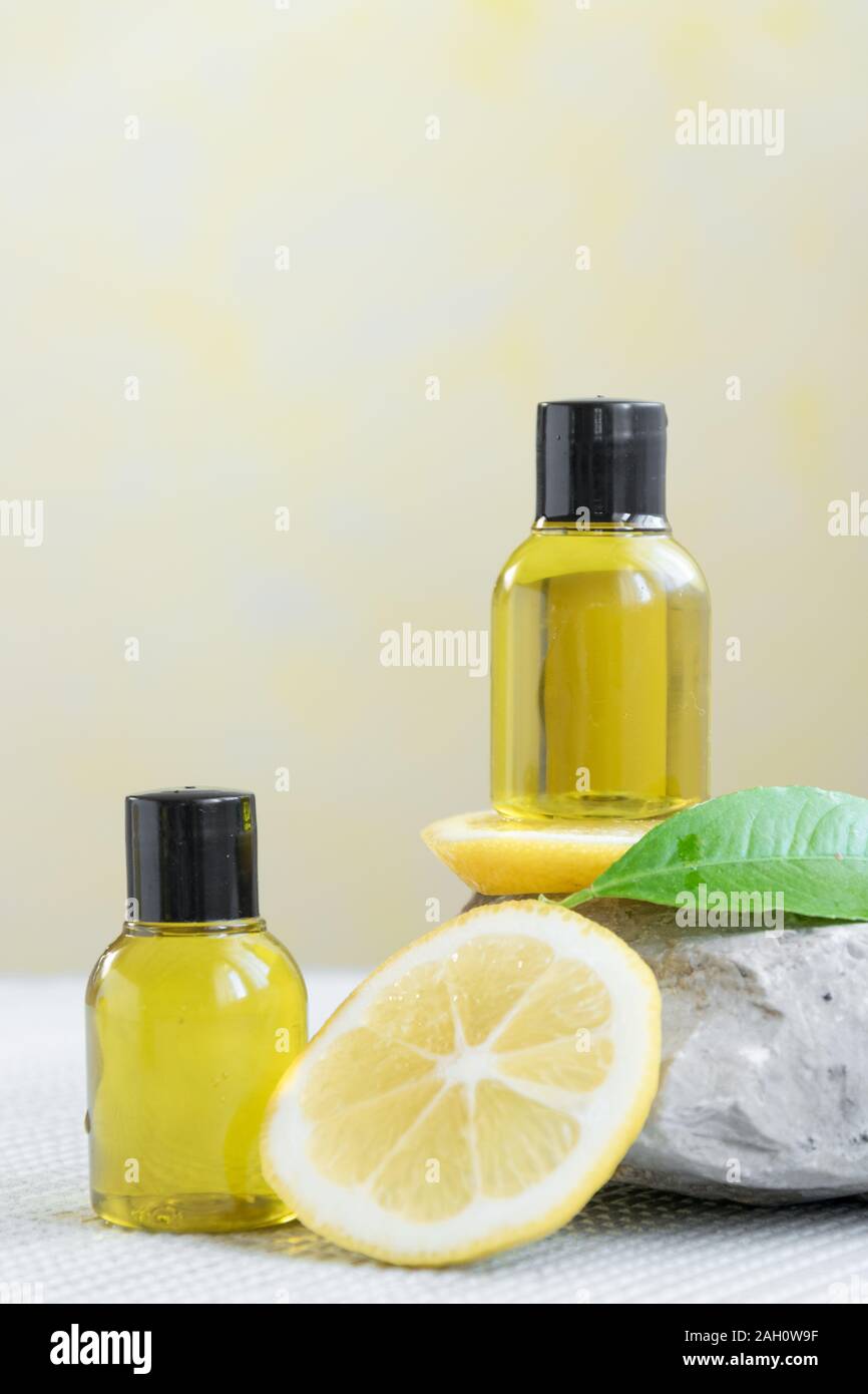 Bottles with essential lemon oil. Healthy natural beauty treatment ...