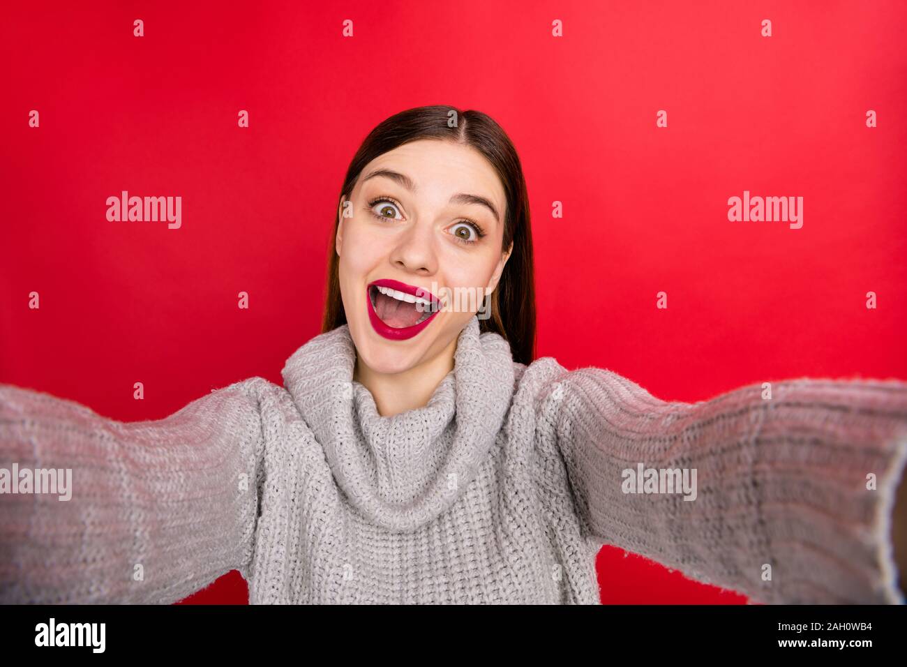 Pretty Overjoyed Lady Making Selfies Wear Knitted Sweater Isolated Red