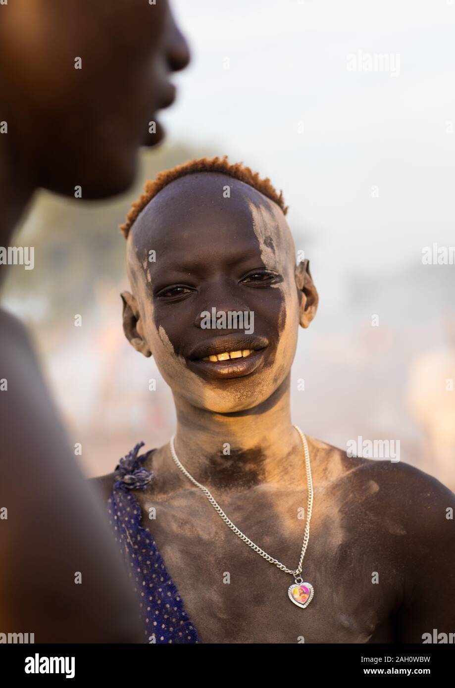 Mundari tribe boy covered in ash to protect from the mosquitoes and flies, Central Equatoria ...