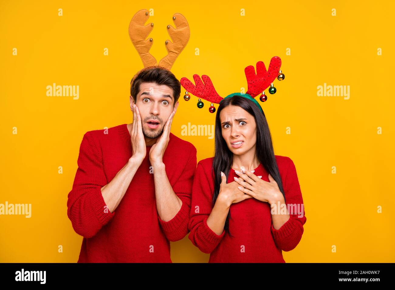 Portrait of two upset people stare in stupor on theme party scream omg ...