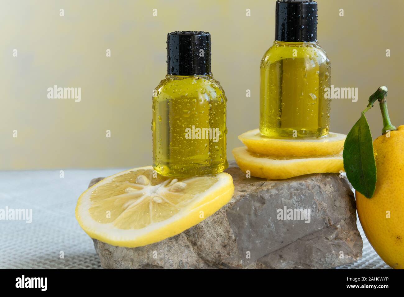 Bottles with essential lemon oil. Healthy natural beauty treatment ...