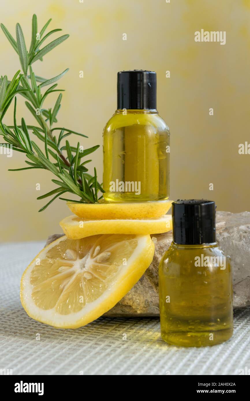 Bottles with essential lemon oil. Healthy natural beauty treatment ...