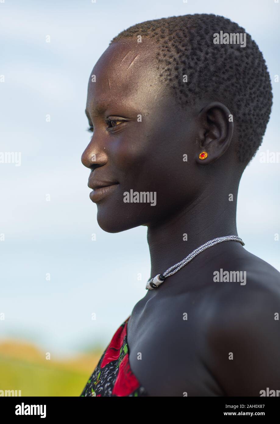 Portrait of a Mundari tribe teenage girl, Central Equatoria, Terekeka, South Sudan Stock Photo ...