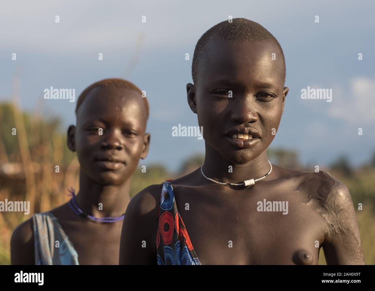 Portrait of Mundari tribe teenage girls, Central Equatoria, Terekeka, South Sudan Stock Photo ...