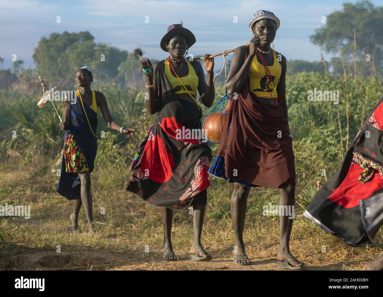 Mundari tribe women marching in line while celebrating a wedding ...