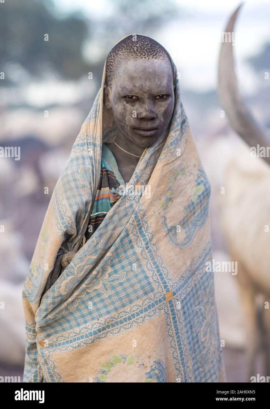 Mundari tribe boy covered in ash to protect from the mosquitoes and ...