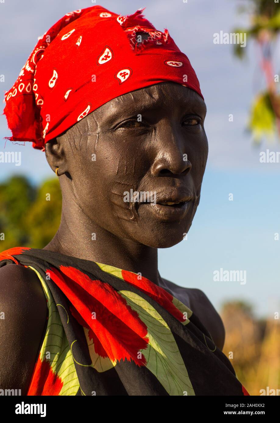 Portrait of a Mundari tribe woman with scarifications on the forehead, Central Equatoria ...