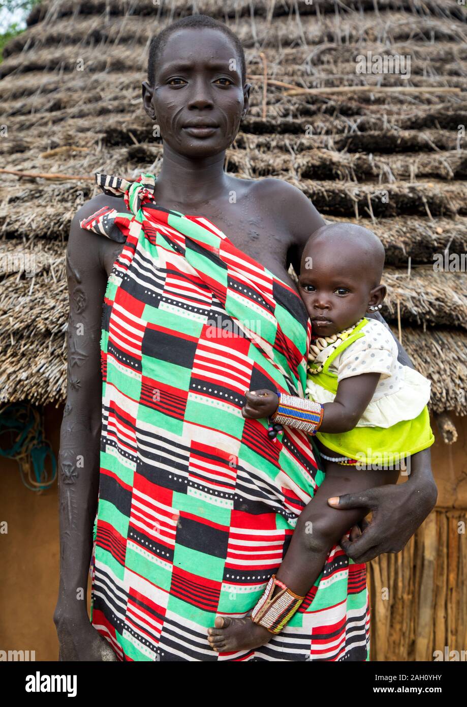 Portrait of a Larim tribe mother carrying her child, Boya Mountains ...