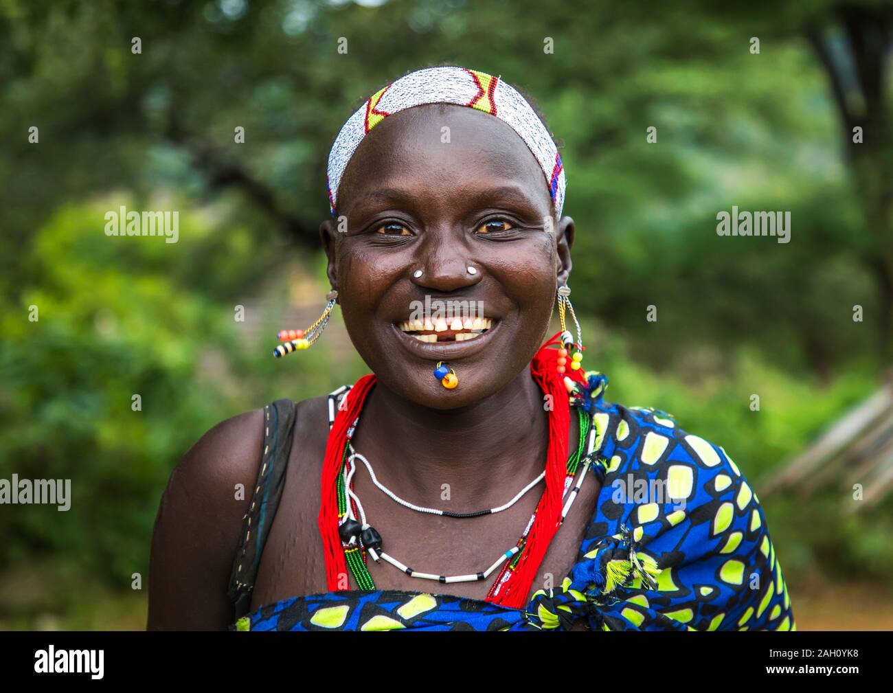 Portrait of a smiling Larim tribe woman, Boya Mountains, Imatong, South ...