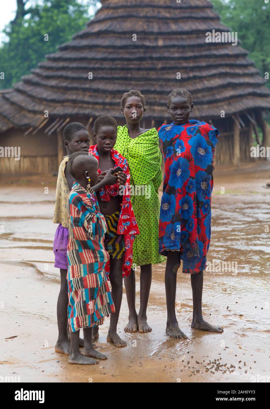 Larim tribe girls under the rain in a village, Boya Mountains, Imatong ...