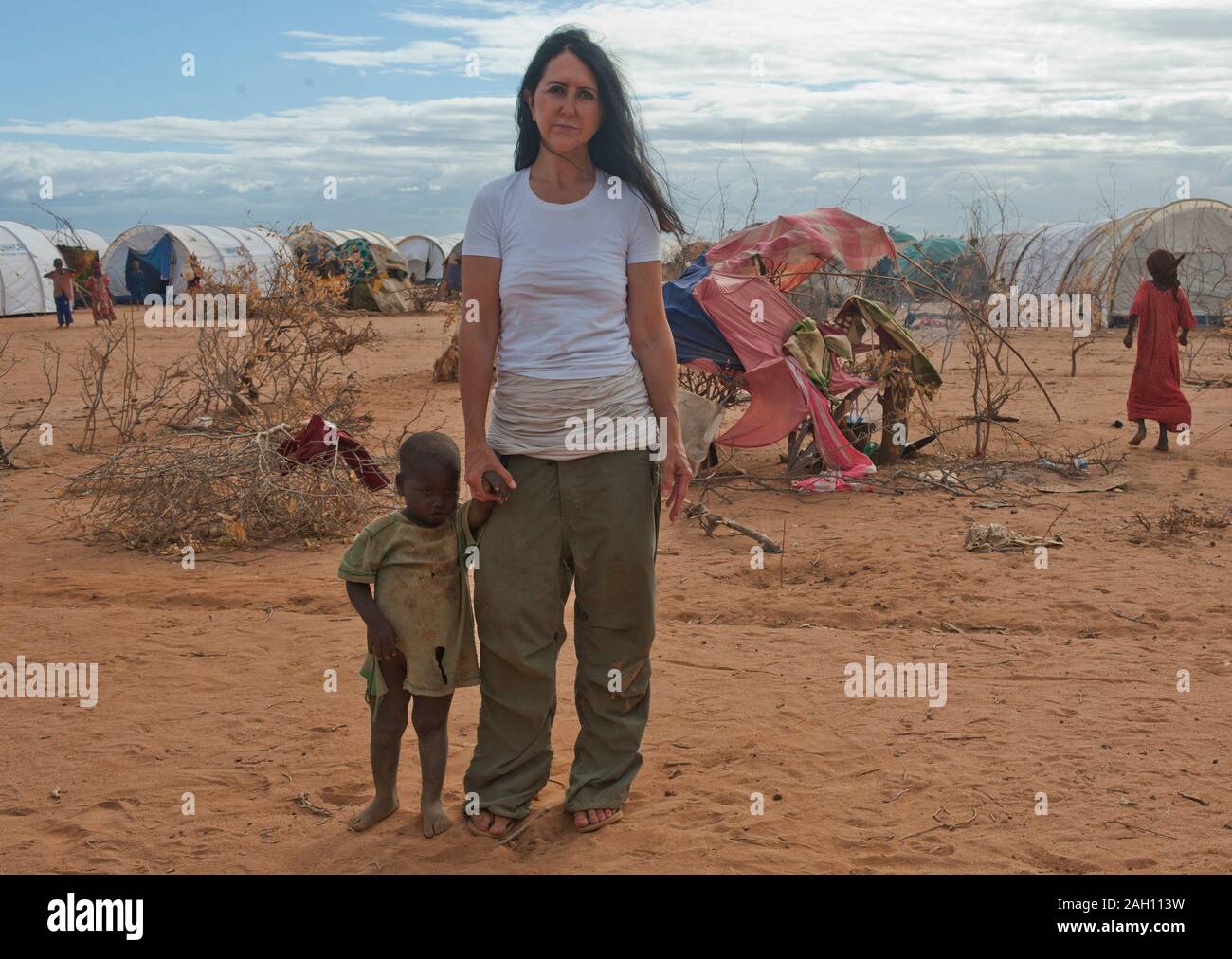 Writer Liz Jones with a young refugee called Hassan, age3, who with his ...