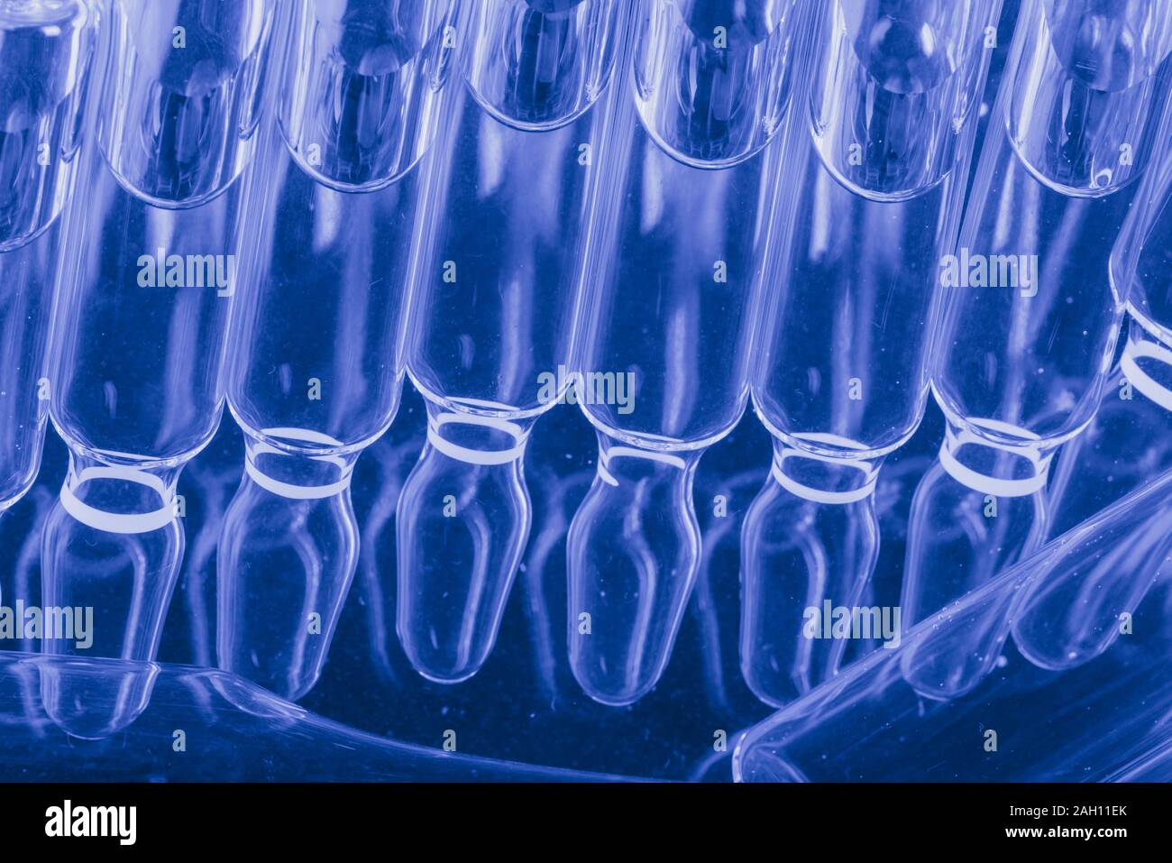 Glass medical ampoule vial for injection. Medicine is liquid sodium ...