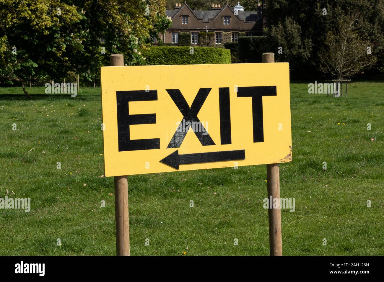 yellow and black Exit Sign Stock Photo - Alamy