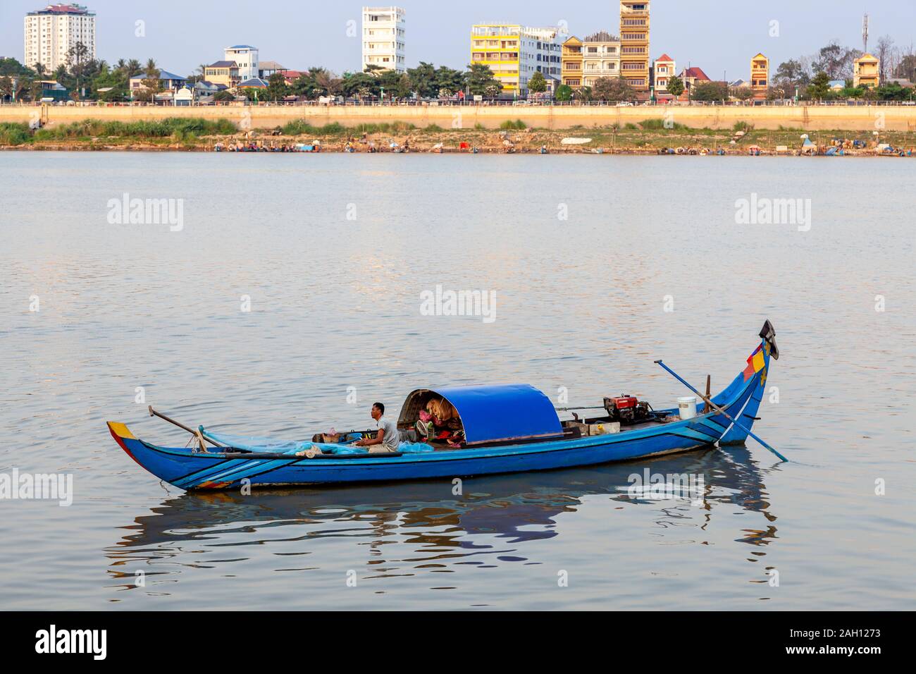 A Traditional Fishing Boat On The Mekong River, Phnom Penh, Cambodia ...