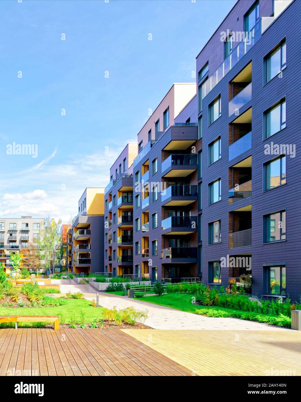 Benches at Modern architectural complex of residential buildings reflex ...