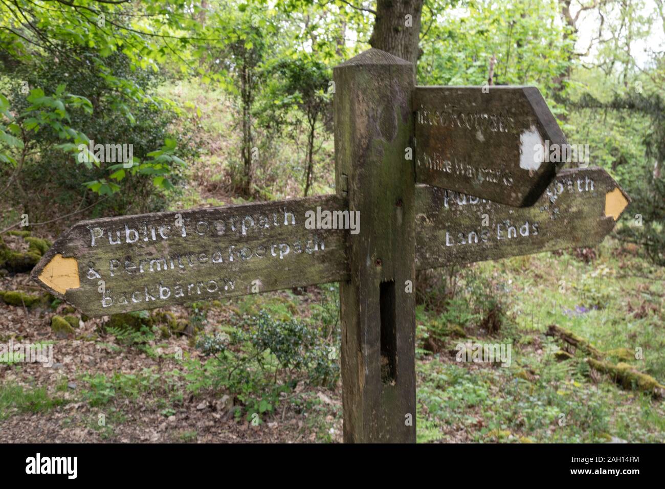 Very old wooden public footpath signpost in The English Lake District ...