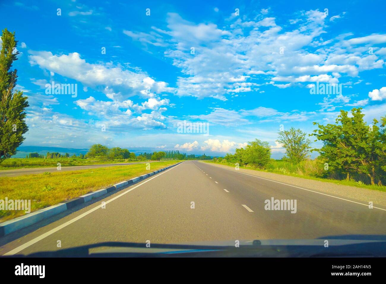 View of the road through window of the car Stock Photo - Alamy