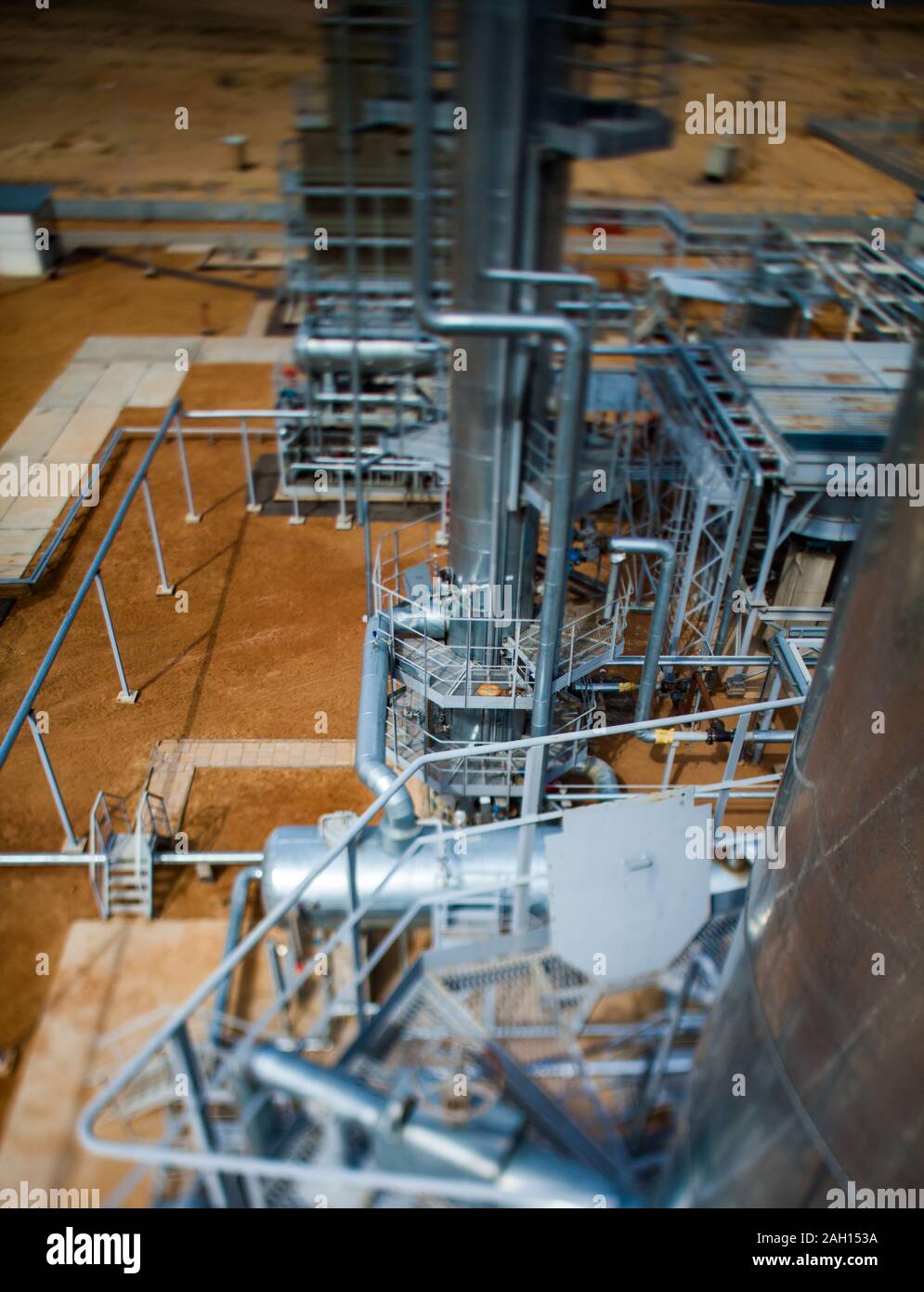 Grey pipes and metal constructions on of an refinery columns on oil ...