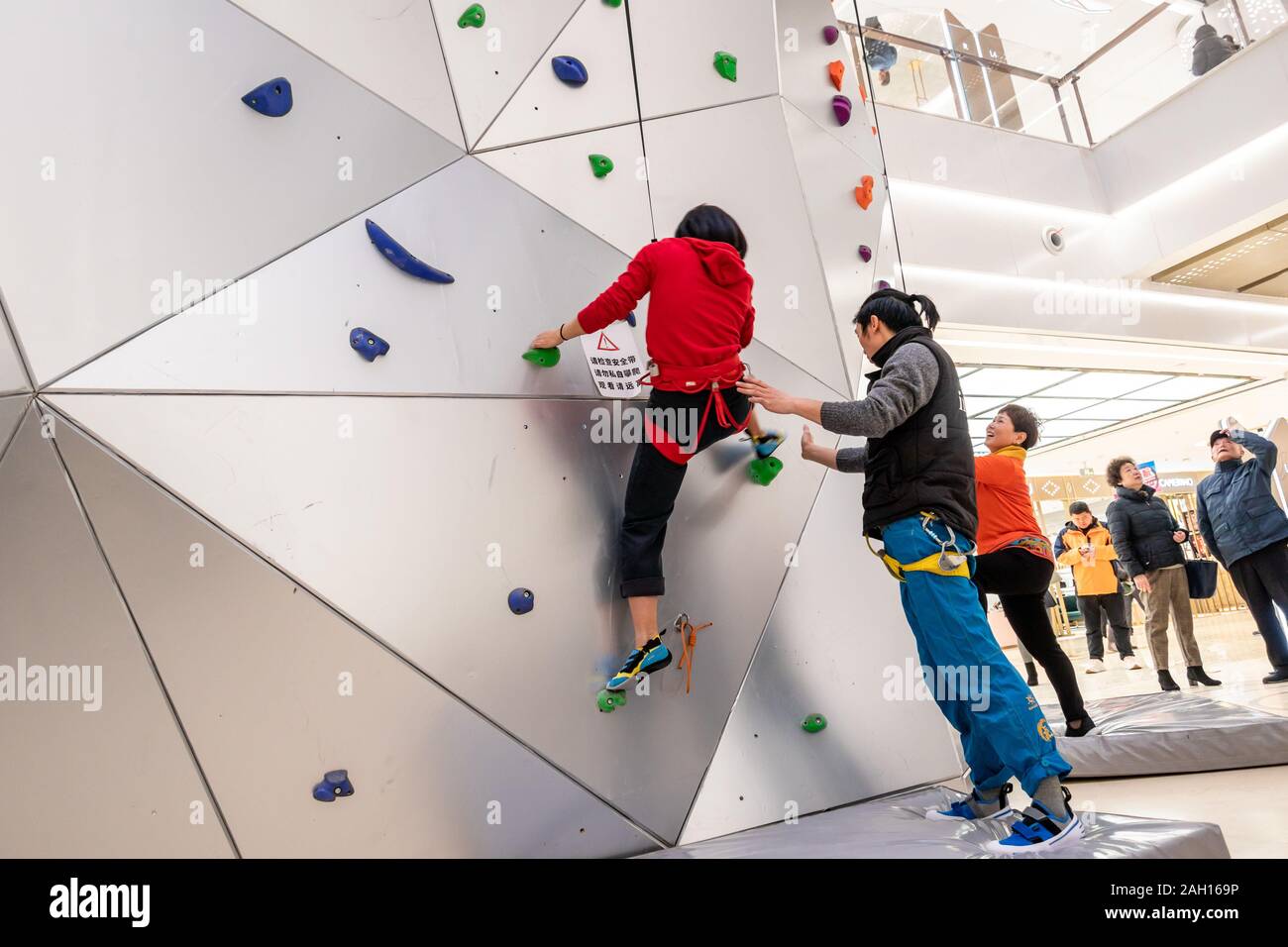 A young woman tries out the 55-meter-tall world's tallest indoor roket ...