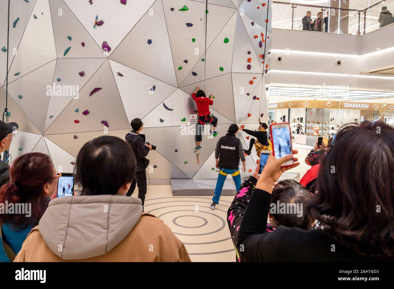 A young woman tries out the 55-meter-tall world's tallest indoor roket ...