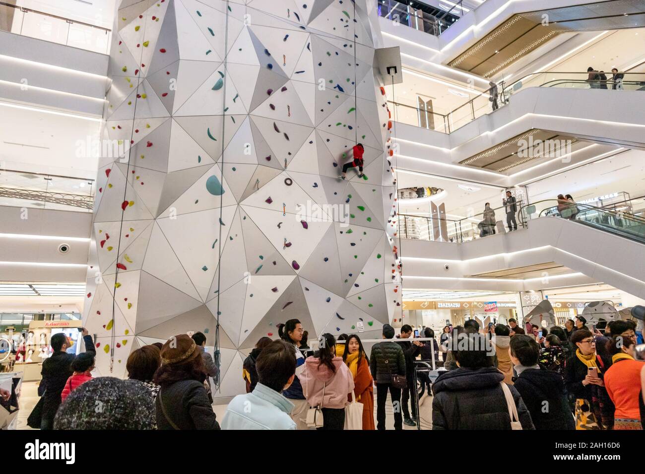 A young woman tries out the 55-meter-tall world's tallest indoor roket ...