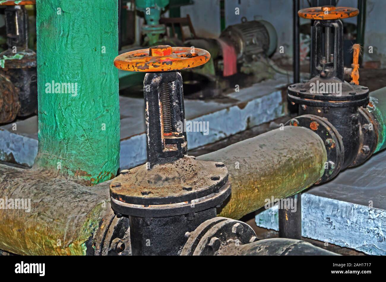 Obsolete plumbing valve with an abandoned basement of a former military ...