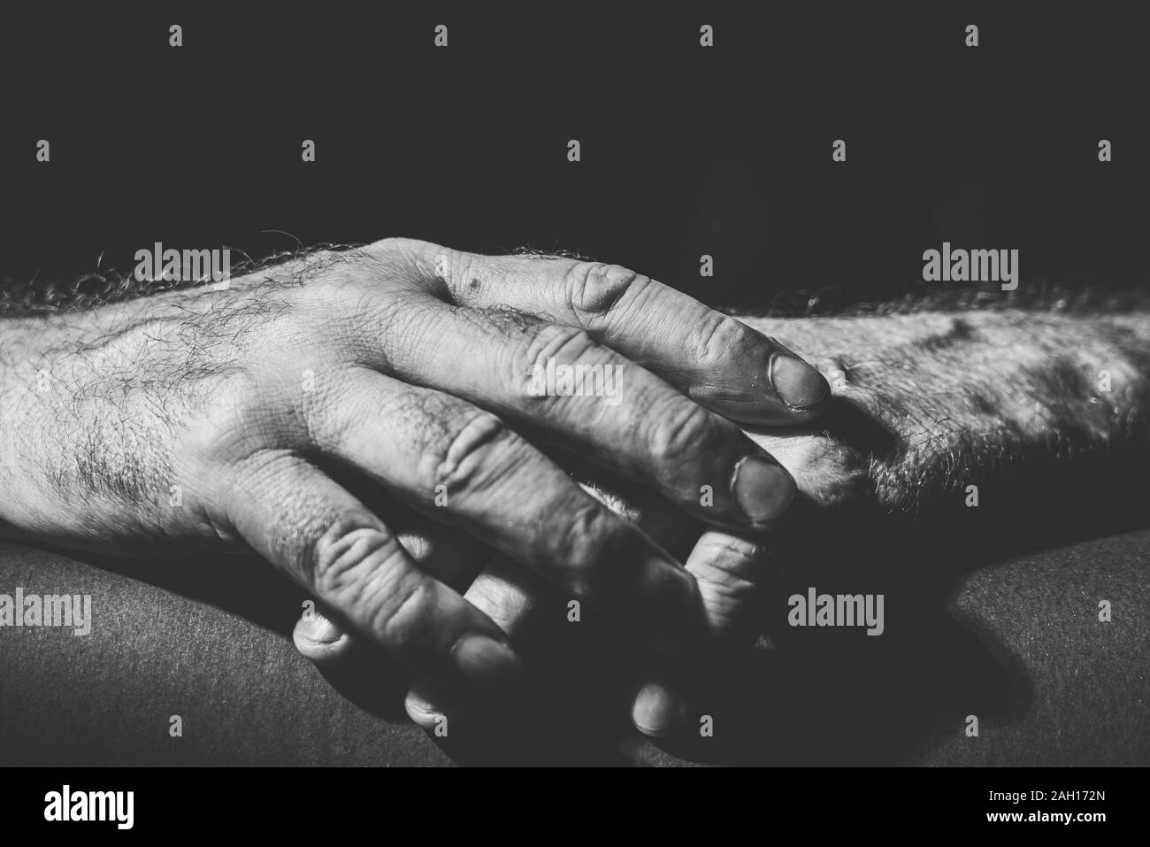 close-up of two hands lying relaxed on top of each other Stock Photo ...