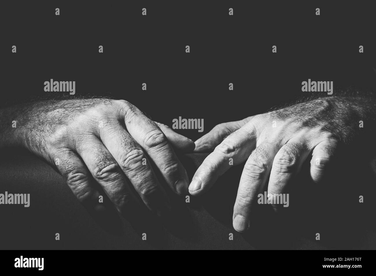 two relaxed hands lying next to each other Stock Photo - Alamy