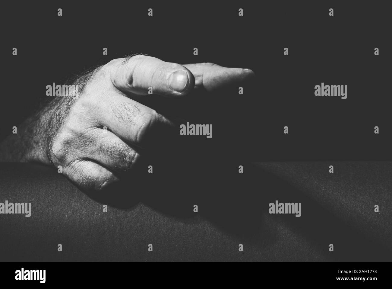 Hand pointing gun Black and White Stock Photos & Images - Alamy