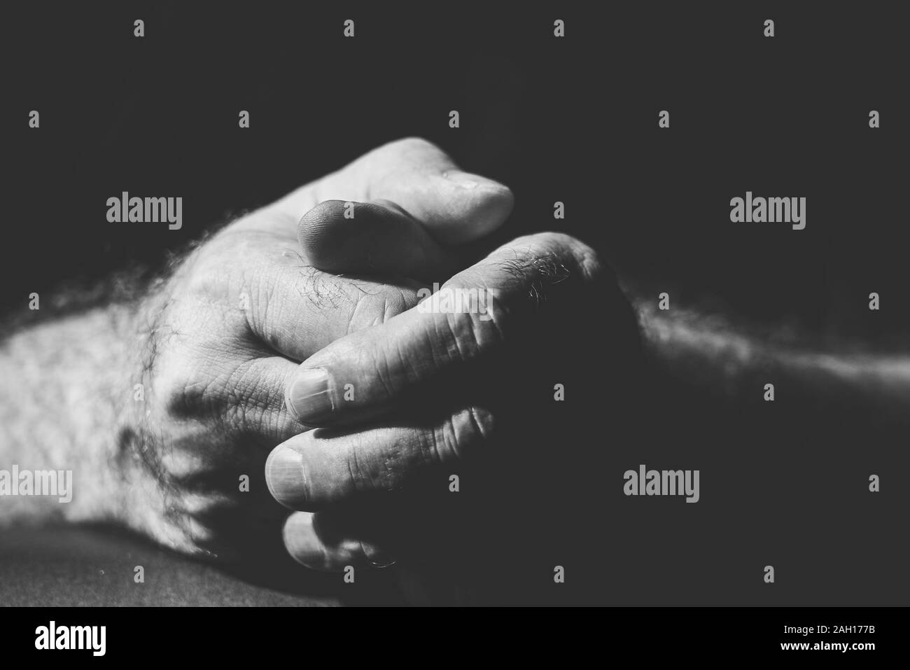 close-up of two hands lying relaxed in each other Stock Photo - Alamy