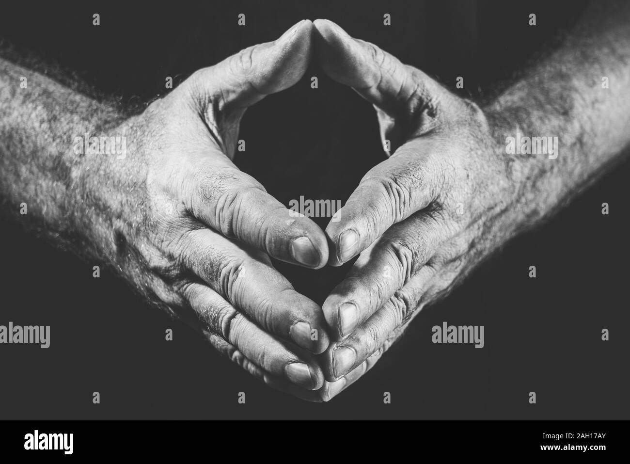 two hands expressing concentration, in black and white Stock Photo - Alamy