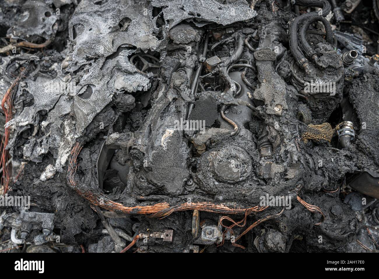 close-up view of molten plastic of a burnt-out car Stock Photo - Alamy
