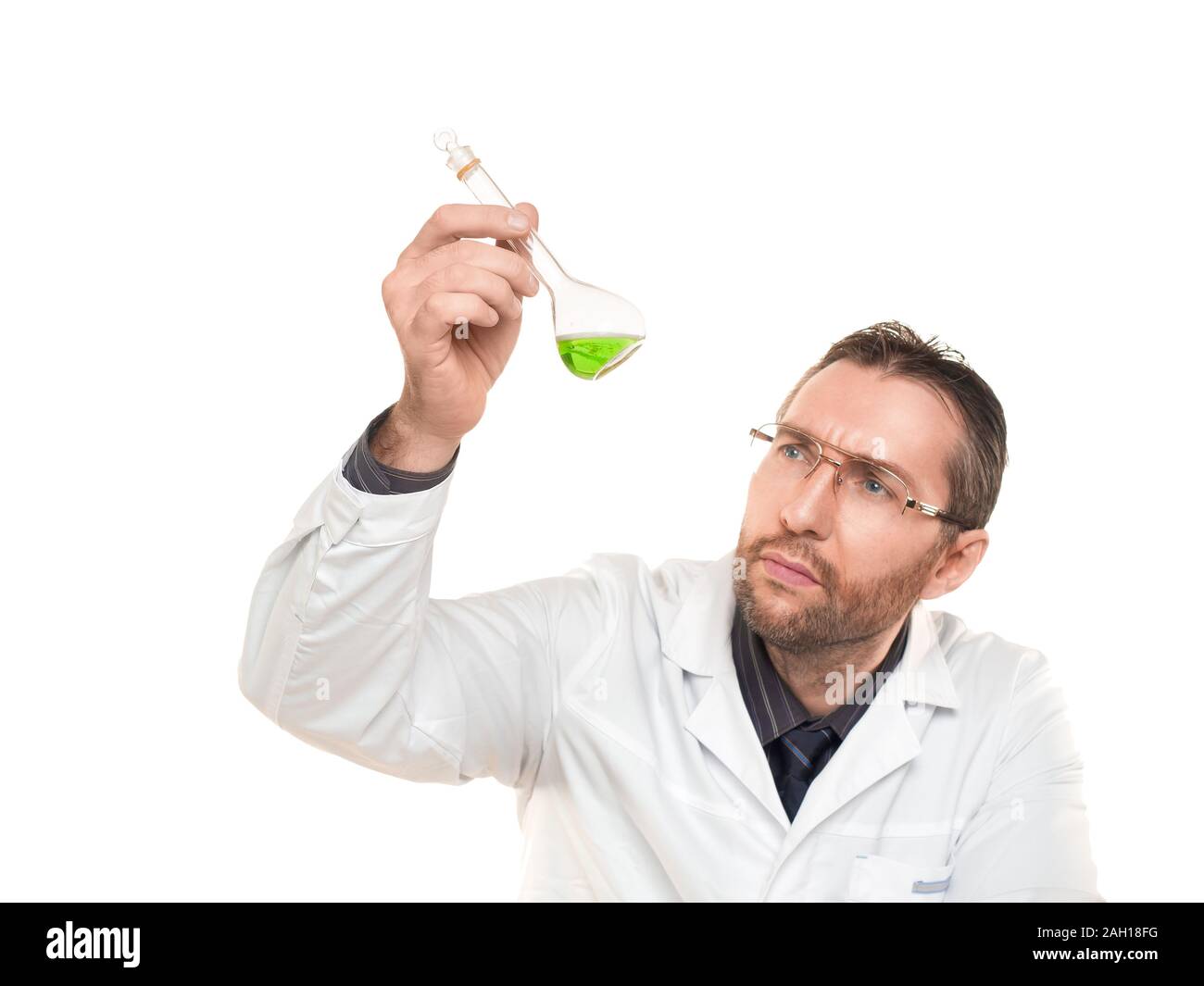 Male scientist looking beaker hi-res stock photography and images - Alamy