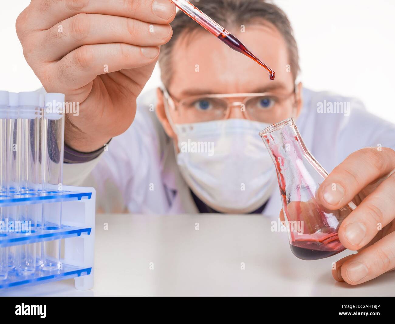 Close up photo of a doctor analyzes the blood samples of patients ...