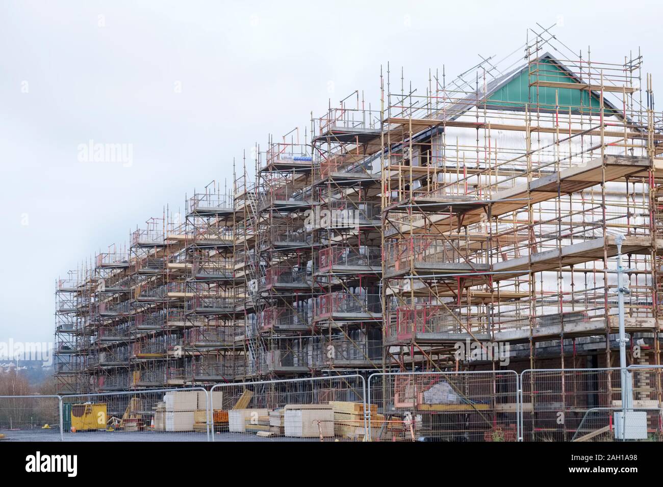 Building affordable homes with scaffolding safety by local construction ...