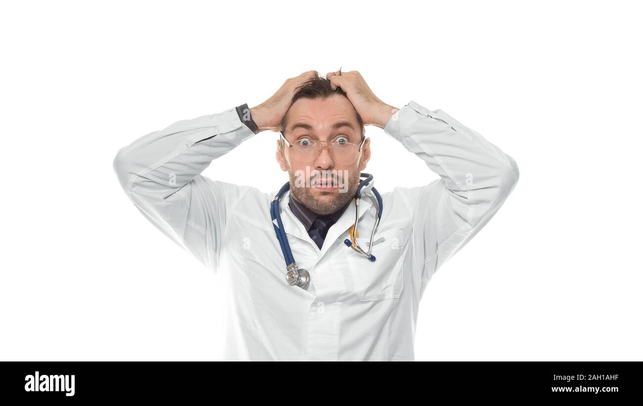 Shocked Doctor over white background. Shocked doctor in eyeglass ...